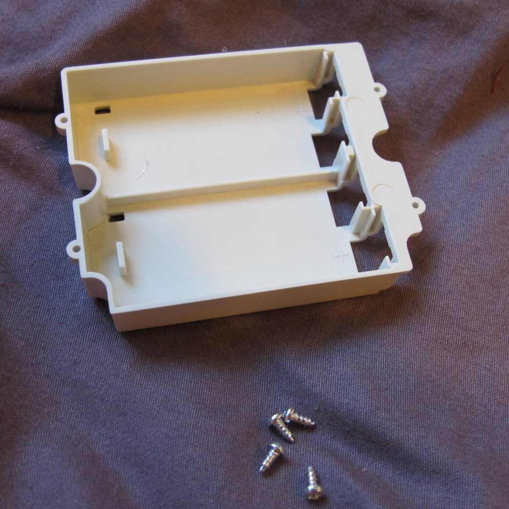 2-9V Battery Holder, includes snap-on contacts. - Box Enclosures: